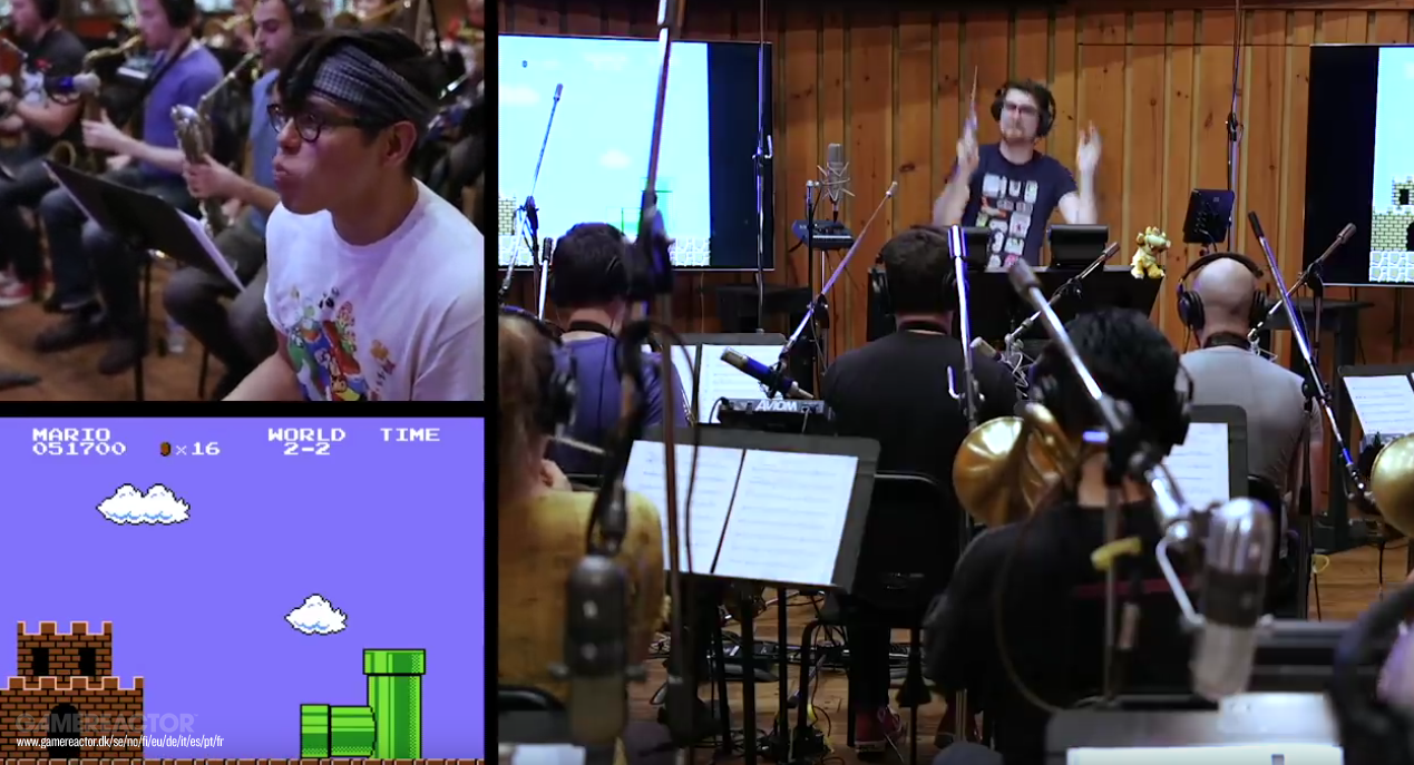 Giocare a Super Mario Bros con un'orchestra che esegue dal vivo la ...